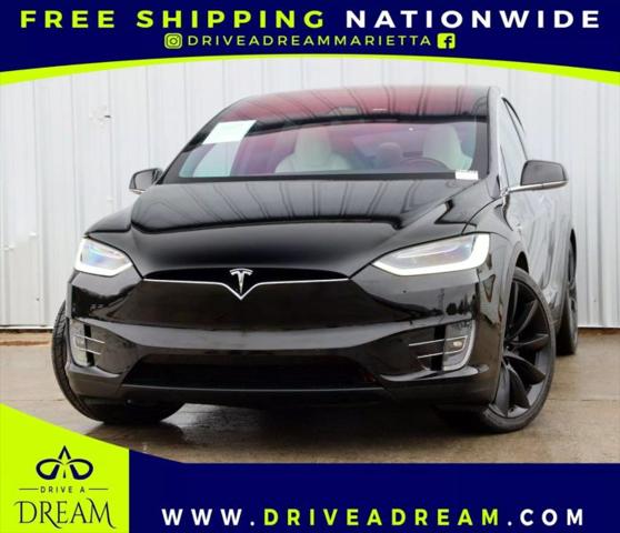 Used model x 100d store